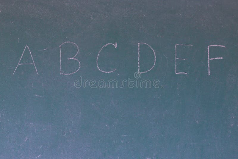 Blackboard with the First Letters of the Alphabet Written on it Stock ...