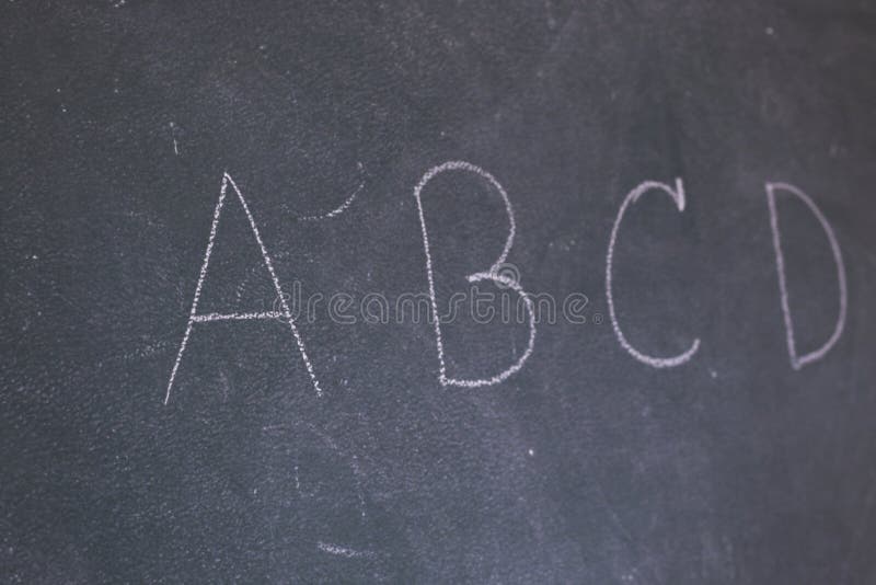 Blackboard with the First Letters of the Alphabet Stock Photo - Image ...