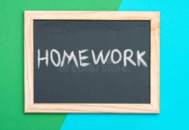 Blackboard with Homework Writing, on a Green and Blue Wall Stock Image ...