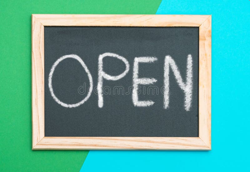 Blackboard with Open Writing, on a Green and Blue Wall Stock Image ...