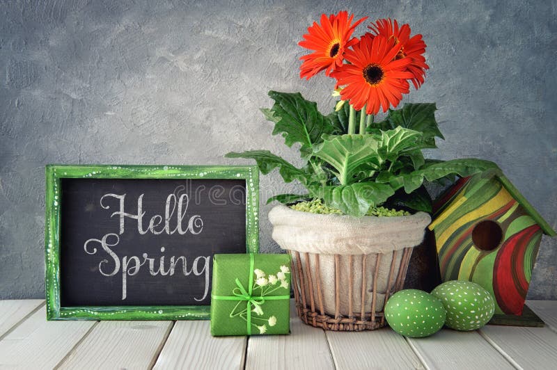 Blackboard with Spring Decorations: Orange Gerberas, Lily of the Valley ...