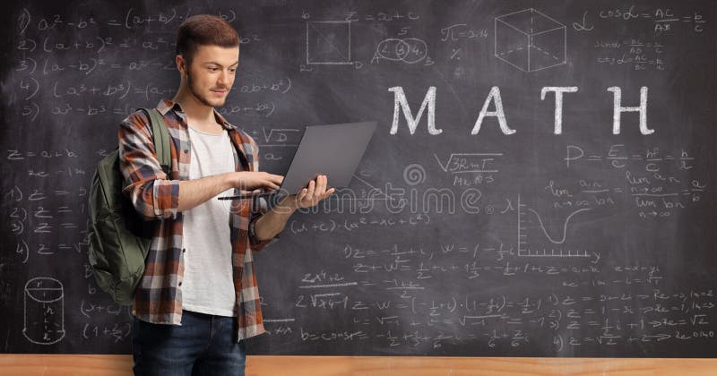 Blackboard with Text Math and Formulas and a Male Student with Laptop ...
