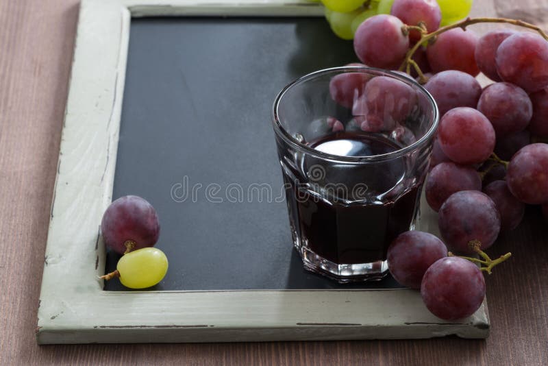 Blackboard for Writing, Glass of Red Wine and Grapes Stock Image ...
