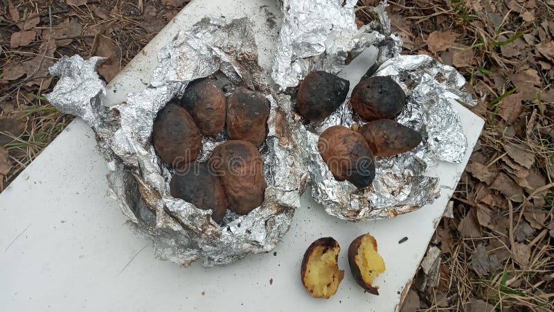 Blackened Potatoes Cooked on an Open Fire in Foil with a Crispy Skin ...