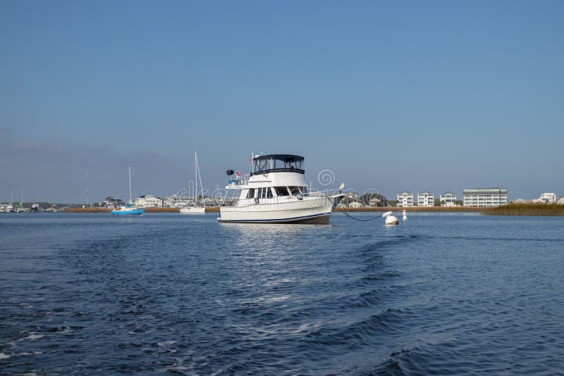 Boats in a Mooring Field in Carolina Beach, NC Stock Photo - Image of ...