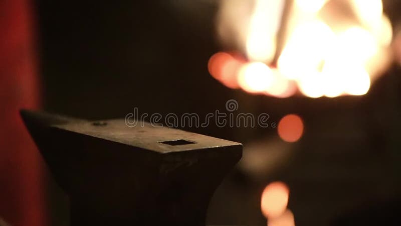 Blacksmith Hitting Hot Metal Bar with Massive Hammer on Anvil in Slow ...