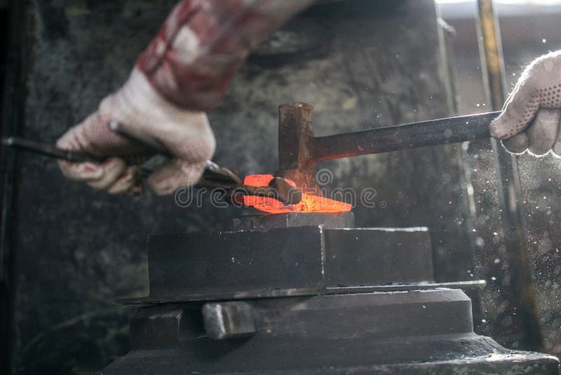 Blacksmith and Anvil. Blacksmith Working with Red Hot Metal Workpiece ...