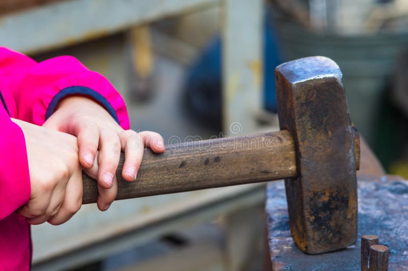 Blacksmith and Apprentice Working on the Anvil Stock Photo - Image of ...