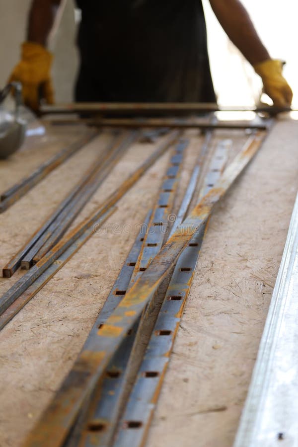 Blacksmith Assembling a Metal Structure for a Fence Stock Image - Image ...