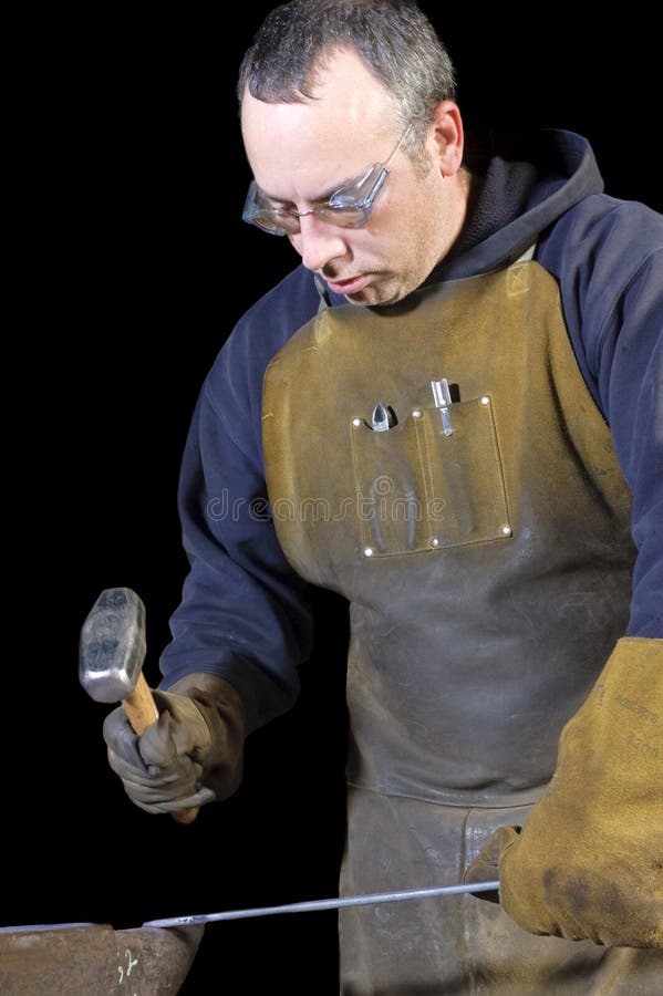 Blacksmith Bending a Wrought Iron Rail Stock Image - Image of grinding ...