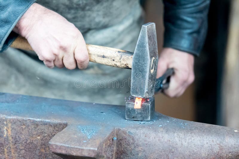 Blacksmith Doing Smithing in an Open Forge Stock Photo - Image of fire ...