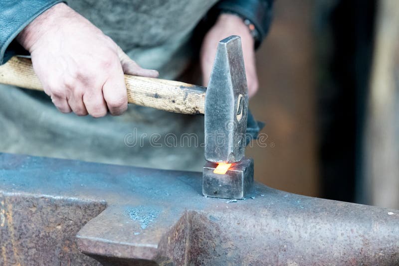 Blacksmith Doing Smithing in an Open Forge Stock Photo - Image of fire ...