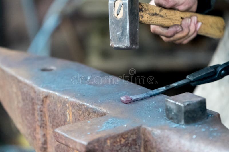 Blacksmith Doing Smithing in an Open Forge Stock Photo - Image of fire ...