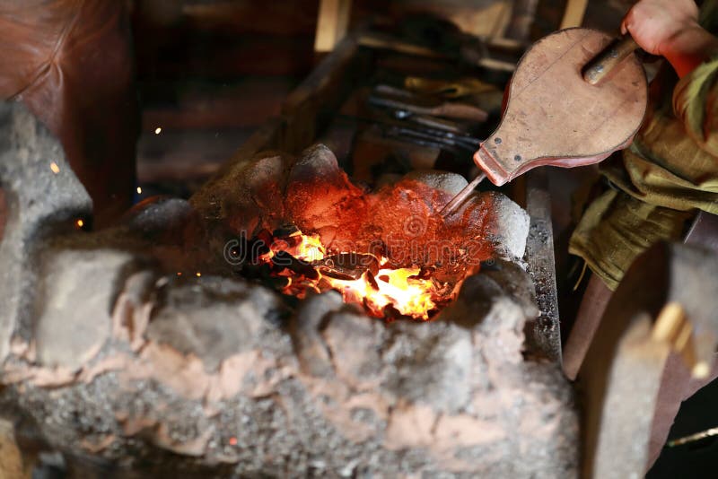 Blacksmith Fanning Fire Stock Photos - Free & Royalty-Free Stock Photos ...
