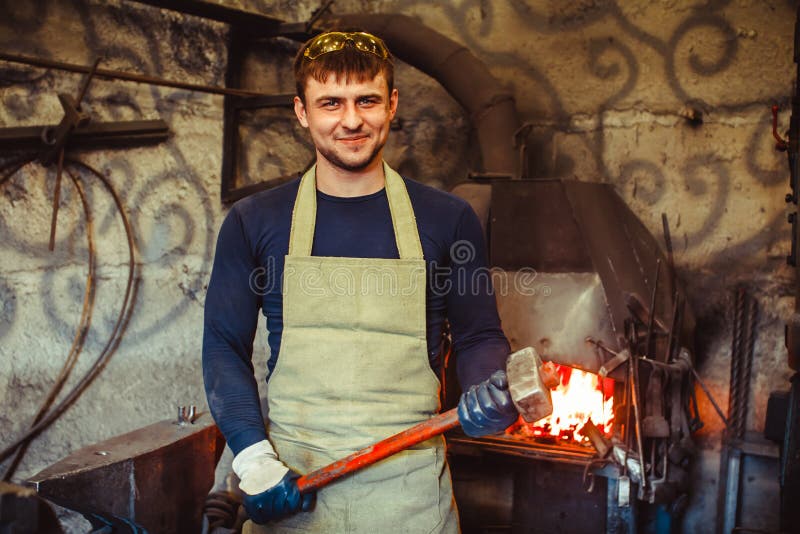 The Blacksmith is at the Forge Stock Photo - Image of brazier ...