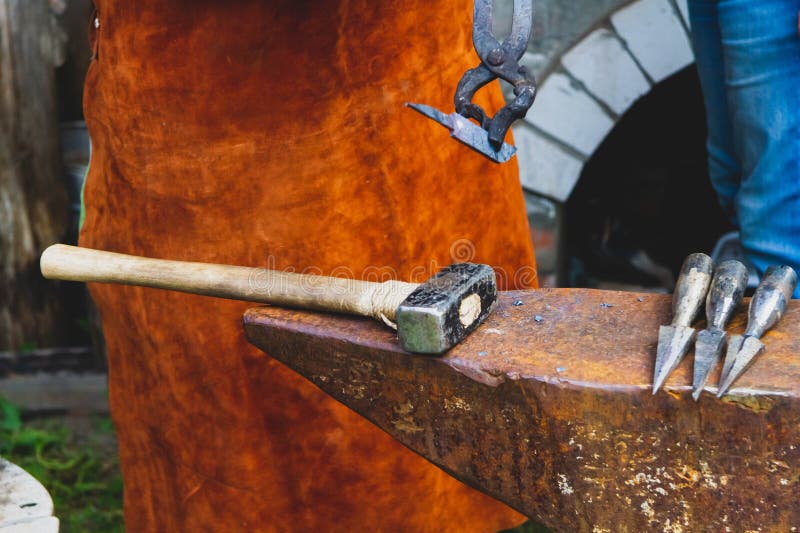 A Blacksmith Forges Iron. Blacksmith& X27;s Workshop Stock Image ...