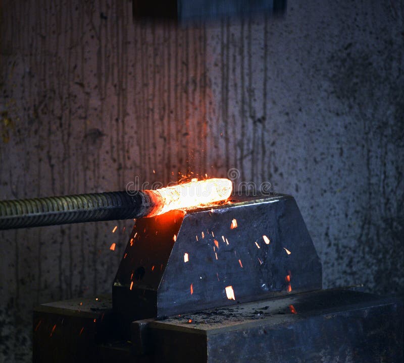 Blacksmith Forges a Red-hot Iron Stock Image - Image of forge, glowing ...