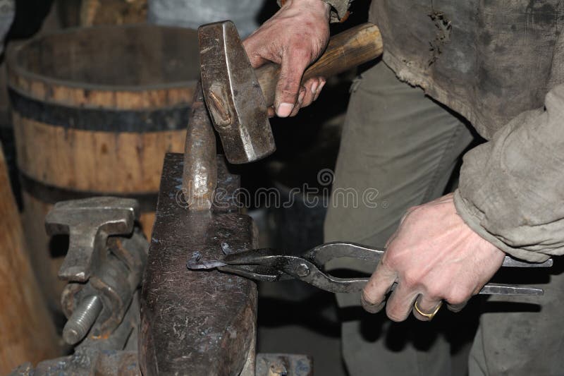 Blacksmith Forges a Red-hot Metal Hammer Stock Image - Image of glove ...