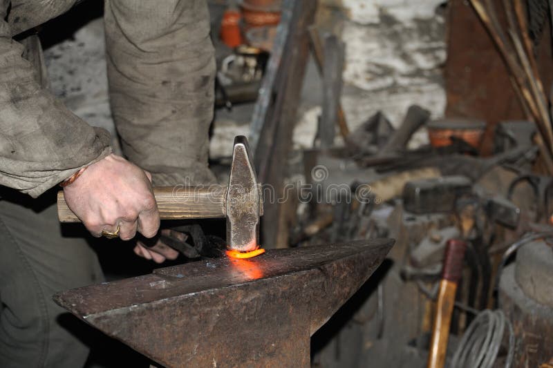 Blacksmith Forges a Red-hot Metal Hammer Stock Image - Image of craft ...