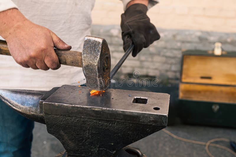 Blacksmith is forging stock photo. Image of body, glove - 284677208