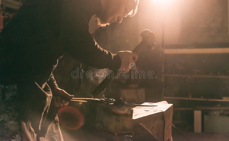 Blacksmith Forging Metal on the Anvil. Stock Photo - Image of smithy ...