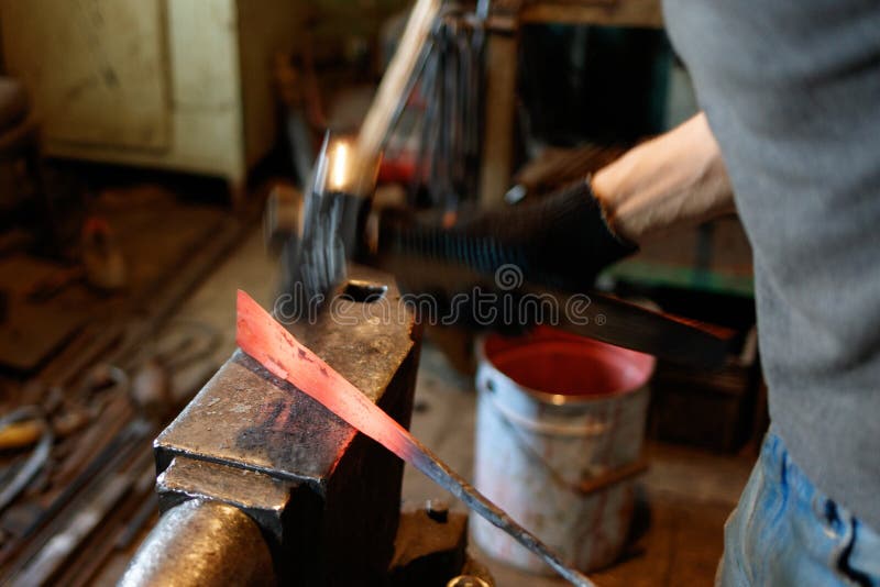 579 Blacksmith Hammering Hot Metal Stock Photos - Free & Royalty-Free ...