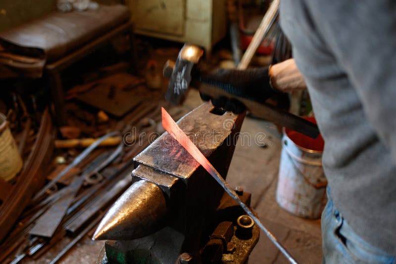 Blacksmith Forging Red-hot Metal with Hammer. Stock Image - Image of ...