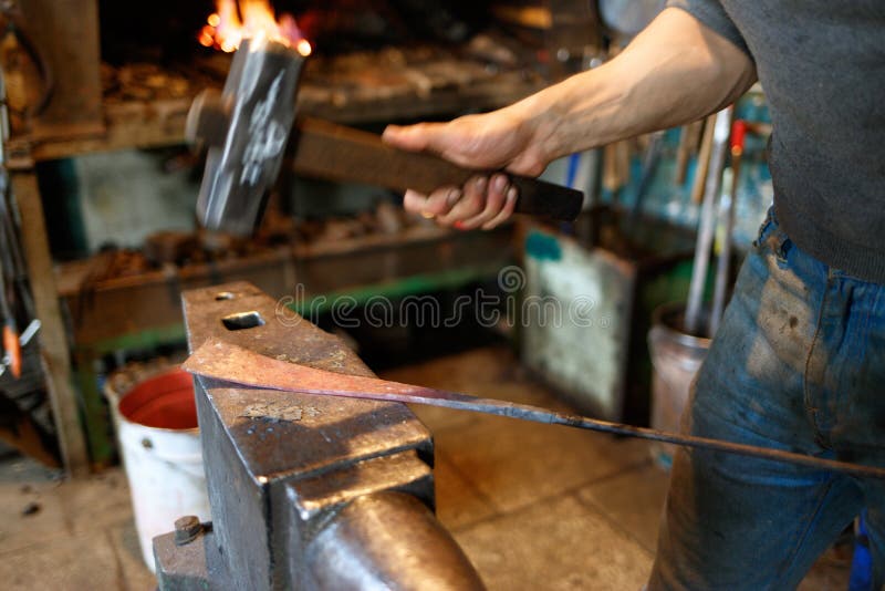 Blacksmith Forging Red-hot Metal with Hammer. Stock Image - Image of ...