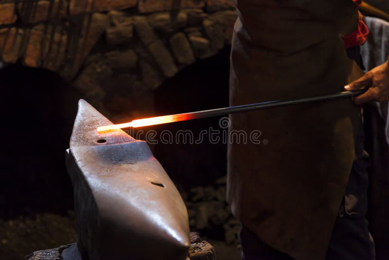 Blacksmith Forging Steel on the Anvil Stock Image - Image of flame ...