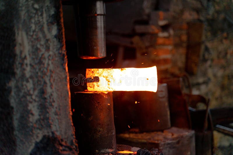 The Blacksmith is Forging Very Hot Iron To Make Various Tools Stock ...