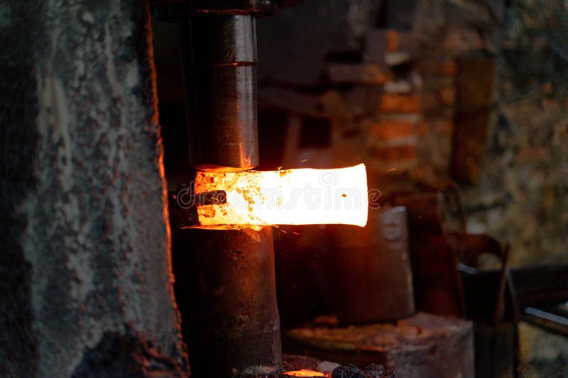 The Blacksmith is Forging Very Hot Iron To Make Various Tools Stock ...