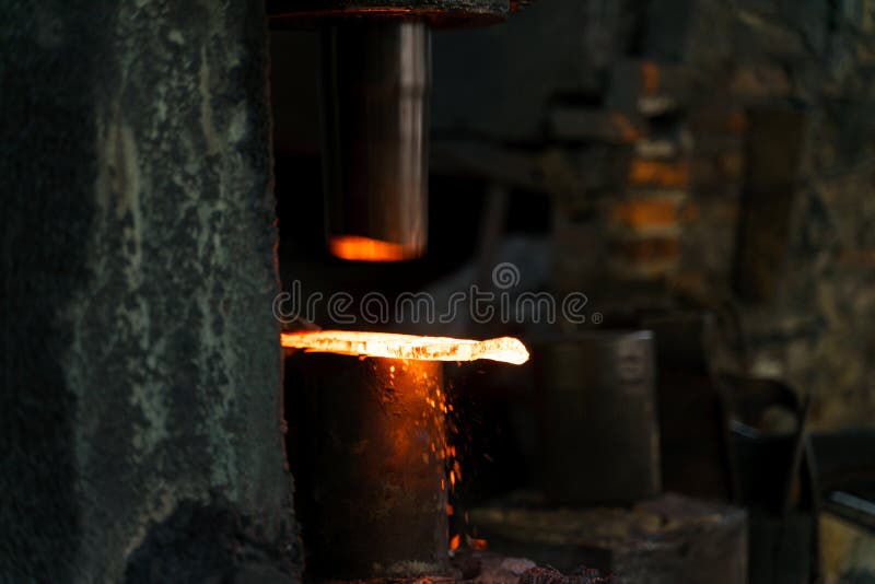 The Blacksmith is Forging Very Hot Iron To Make Various Tools Stock ...