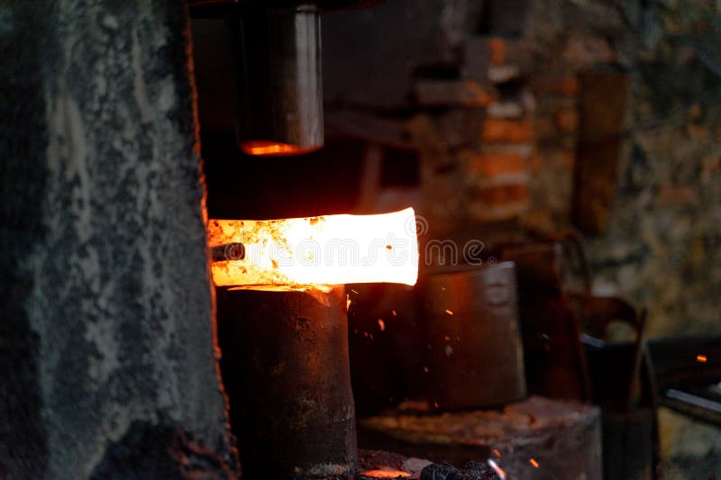 The Blacksmith is Forging Very Hot Iron To Make Various Tools Stock ...