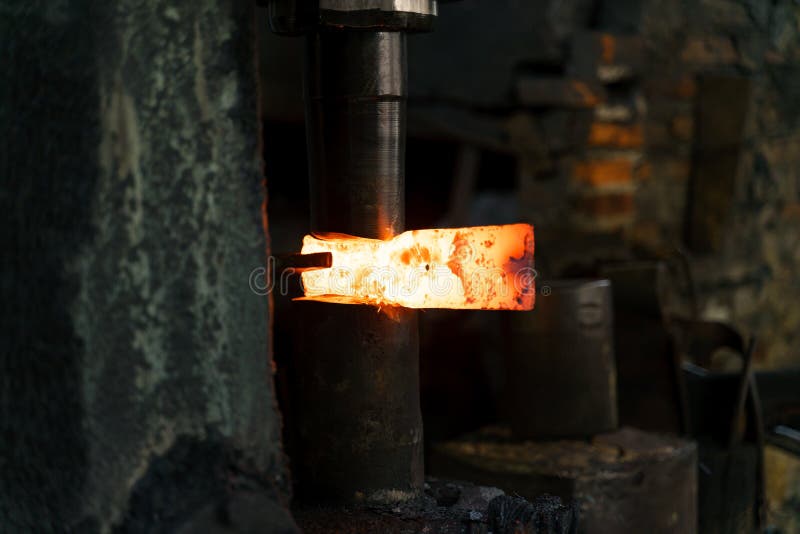 The Blacksmith is Forging Very Hot Iron To Make Various Tools Stock ...