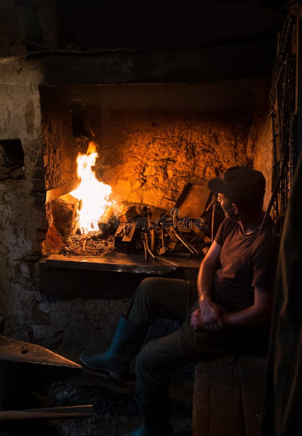 Blacksmith in Front of the Oven Stock Photo - Image of blacksmith ...