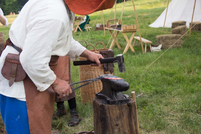 Blacksmithing. Hammer and Anvil. Blacksmith Forging Iron. Medieval ...