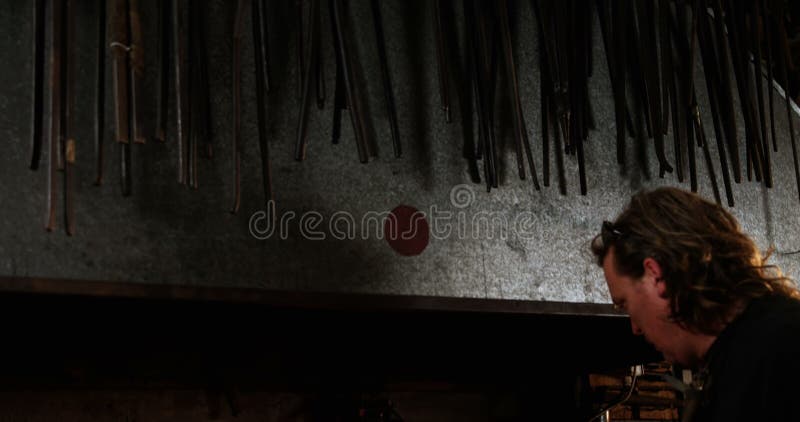 Blacksmith Heating Metal Rod in Fire 4k Stock Footage - Video of ...