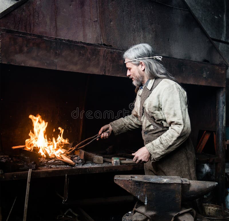 Rustic Blacksmith Forges Item on the Anvil Stock Image - Image of close ...