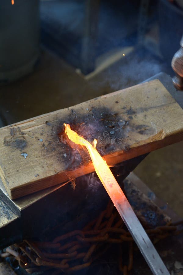 Blacksmith in His Home Workshop Making Tools Stock Image - Image of ...
