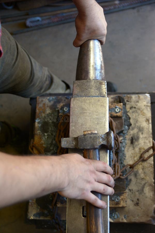 Blacksmith in His Home Workshop Making Tools Stock Photo - Image of ...
