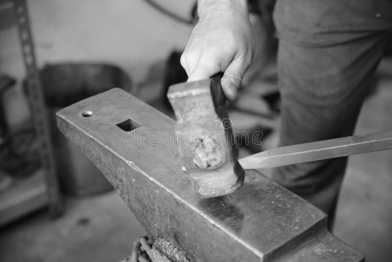 Blacksmith in His Home Workshop Making Tools Stock Photo - Image of ...