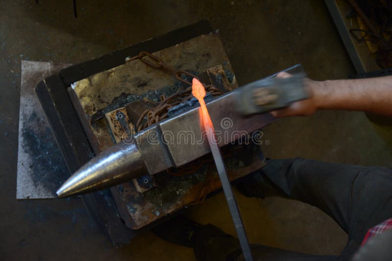 Blacksmith in His Home Workshop Making Tools Stock Photo - Image of ...