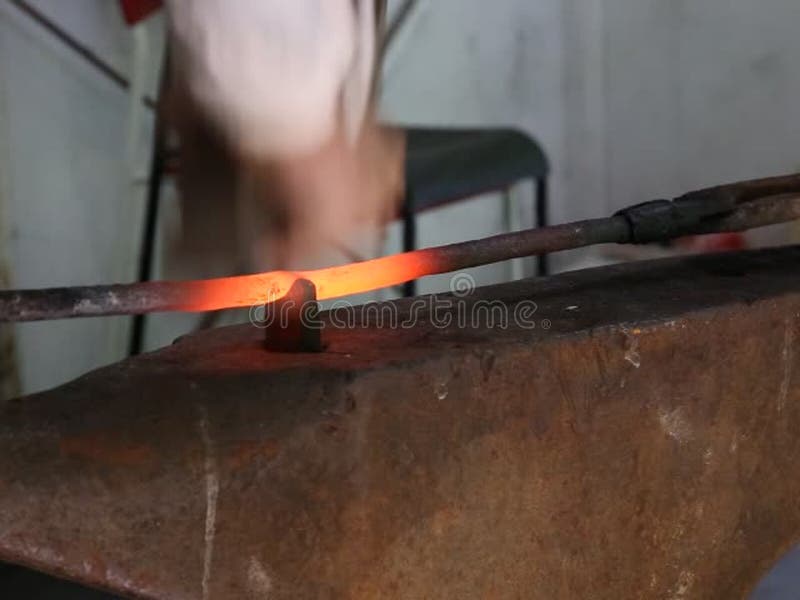 The Blacksmith Hitting the Hot Iron Stock Video - Video of metallic ...