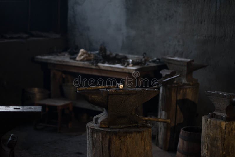 Blacksmith Holding Iron Work in Forge Stock Photo - Image of craftwork ...