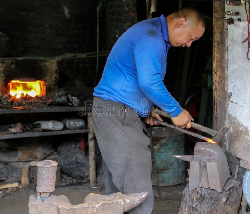 Blacksmith in Liujiang Town,sichuan,china Editorial Photography - Image ...