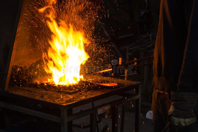 The Blacksmith Making Flames in Smithy Stock Photo - Image of equipment ...