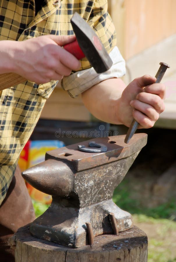 Blacksmith Making Horseshoes Stock Photo - Image of labor, forge: 5364224