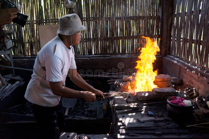 Blacksmith editorial image. Image of weapon, meat, people - 56195615