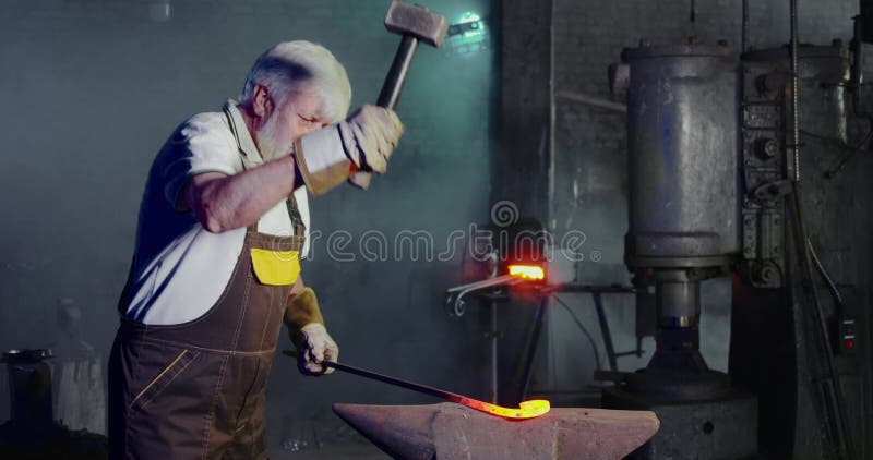 Blacksmith Working in Mastershop. Stock Footage - Video of beating ...