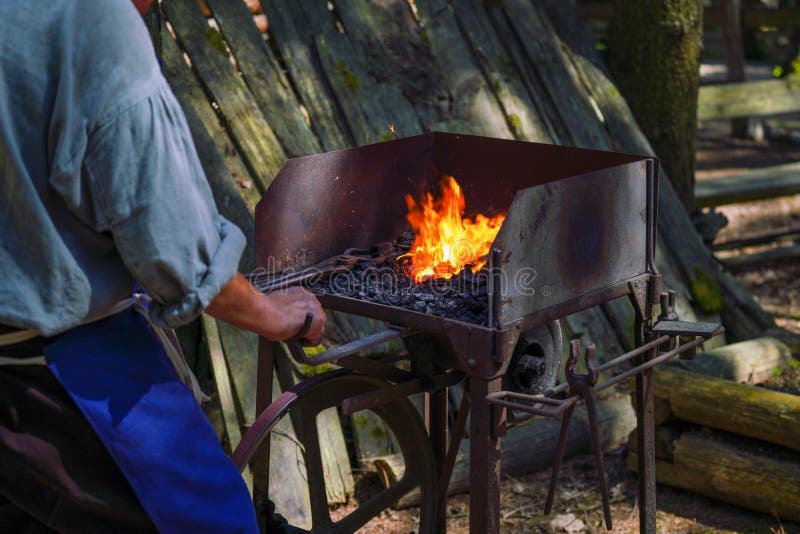 Blacksmith with Red-hot Iron Stock Photo - Image of handicraft, melting ...